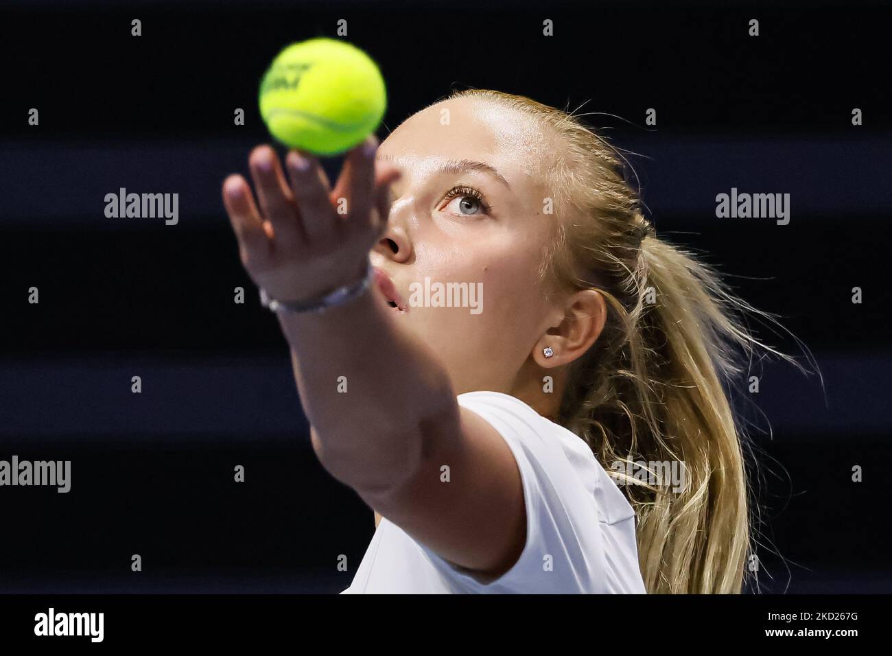 Anastasia Potapova of Russia serves the ball to Maria Sakkari of Greece ...
