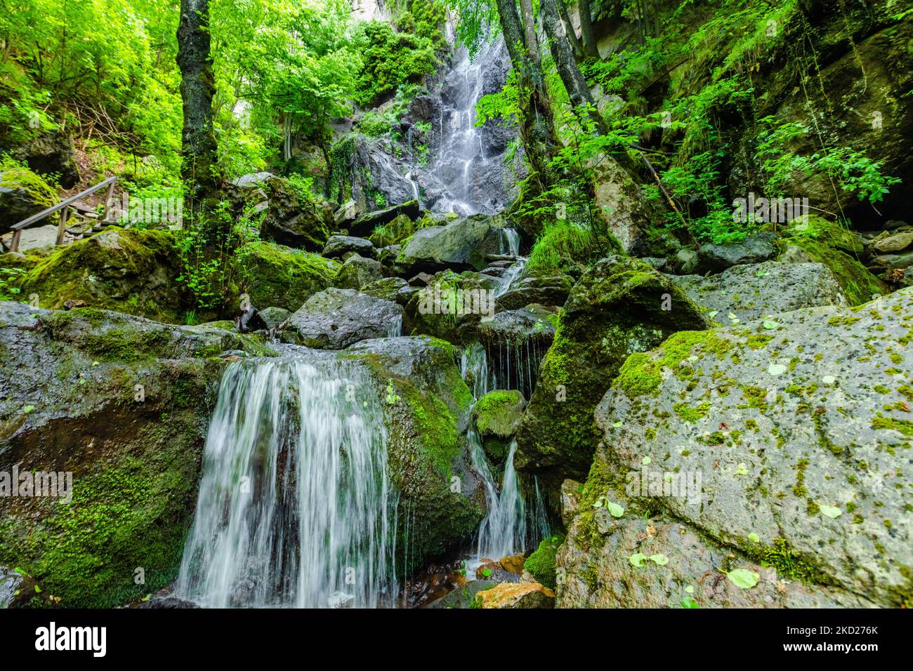 waterfall in deep mountain with large rocks Stock Photo - Alamy
