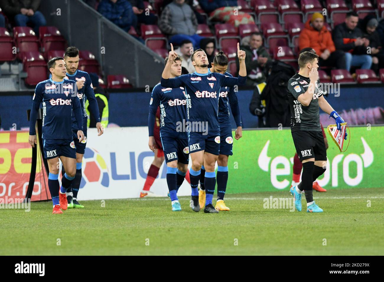 Players of UTA Arad entering on the pitch at the beginning of the game ...