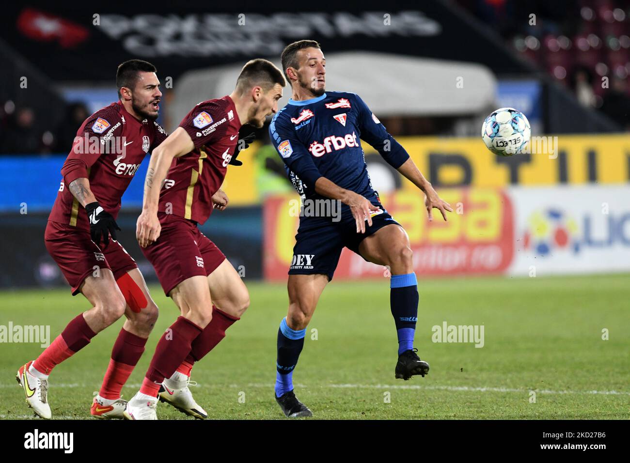 Andrei Burca (L) and Roger (R) in action during CFR Cluj vs UTA Arad ...