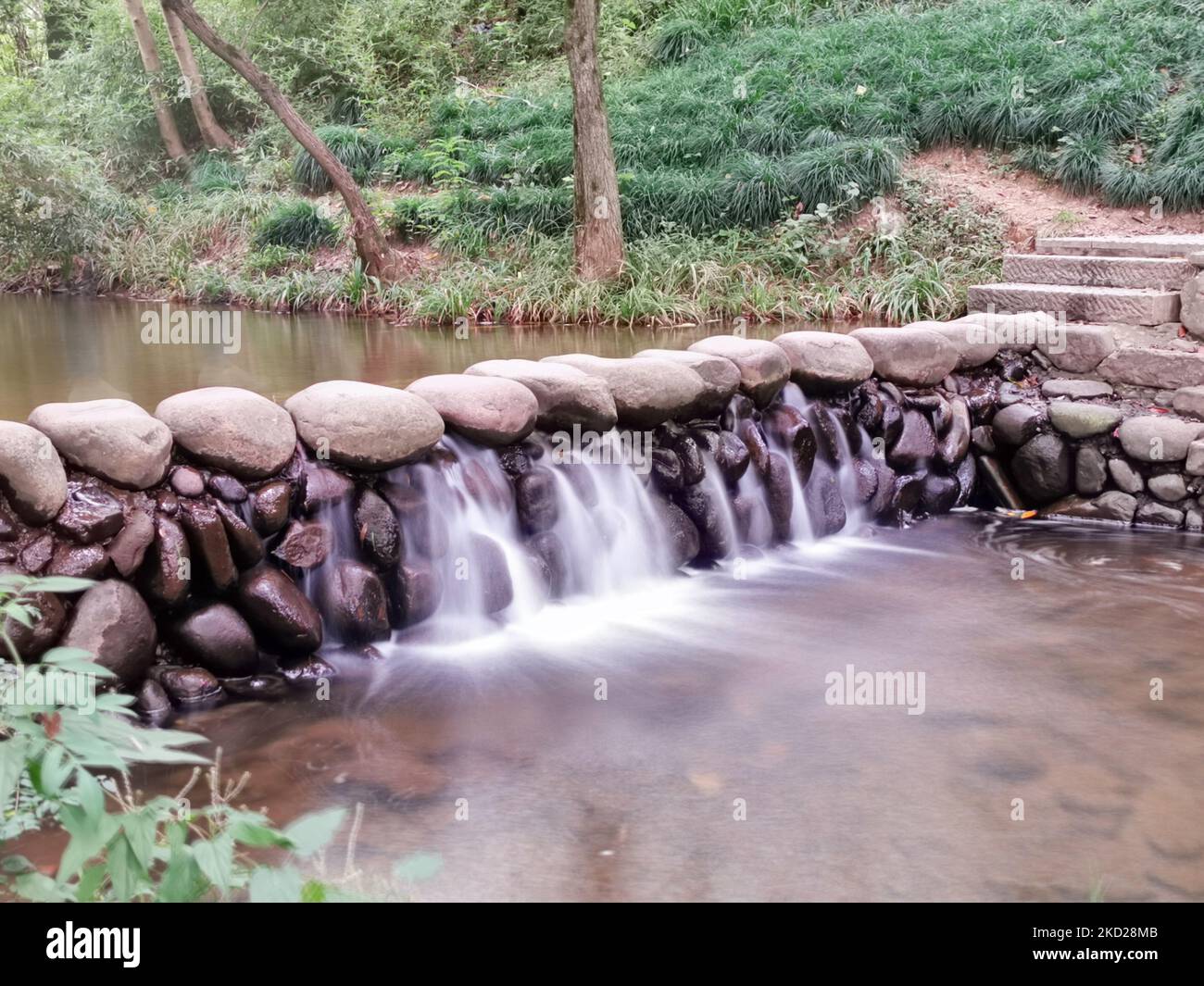water flow in the brook Stock Photo - Alamy