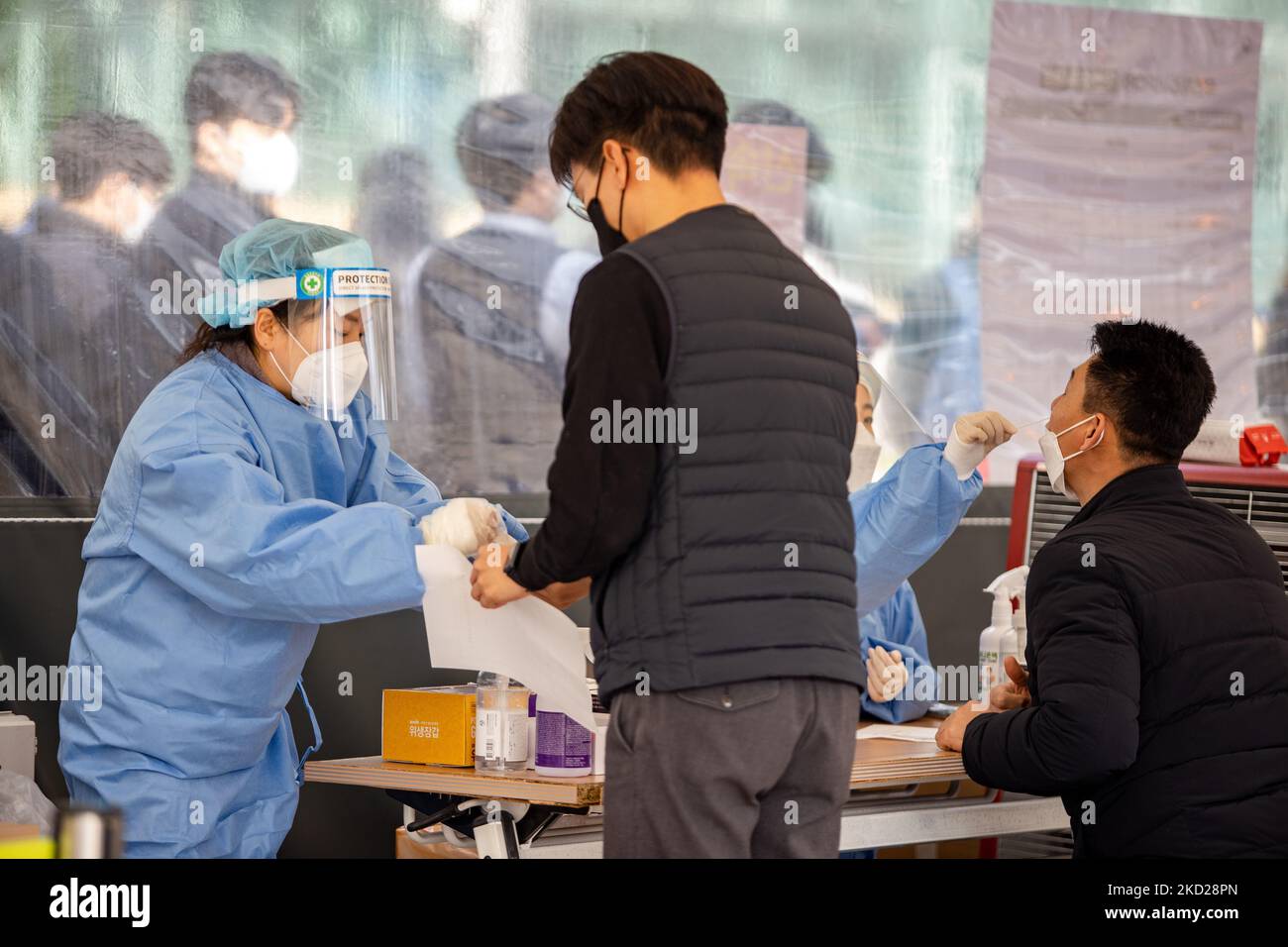Citizens take a COVID-19 test at testing facility at Seoul Metropolitan ...