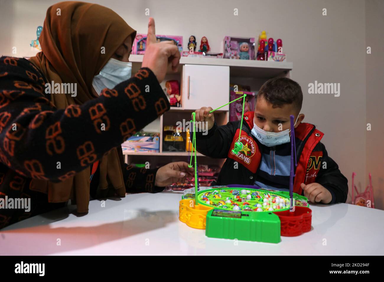 A Palestinian kindergarten child during a day of play therapy at their ...