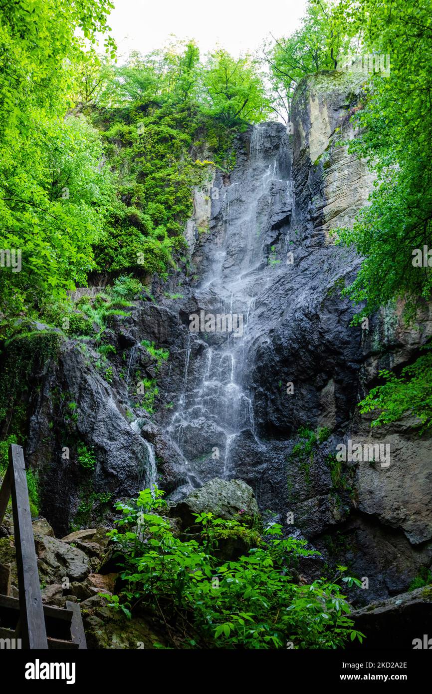 waterfall in deep mountain with large rocks Stock Photo - Alamy