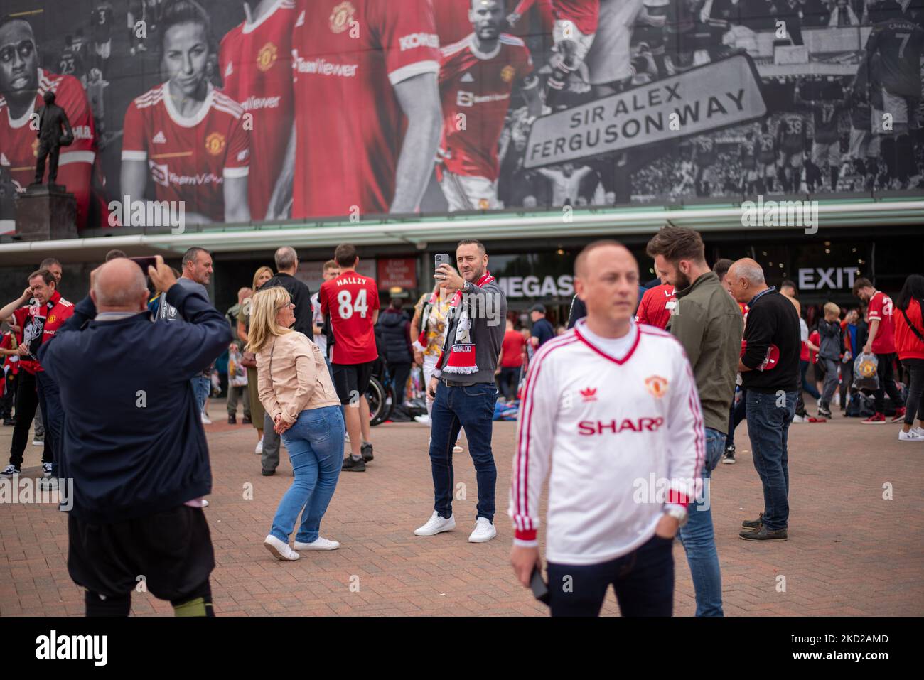 Manchester united fans outside Old Trafford Stock Photo - Alamy