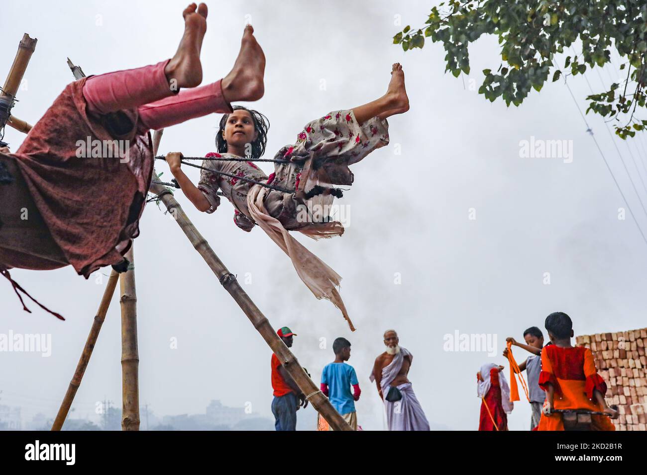 Children in Dhaka's slums play. Often these children are frequently ...