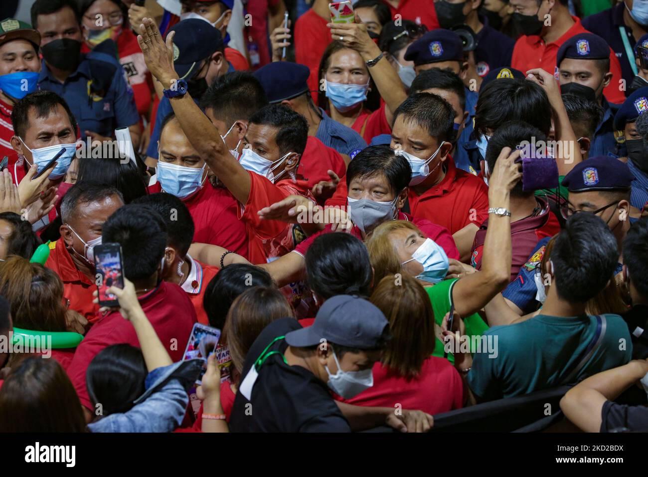 Former senator Ferdinand “Bongbong” Marcos Jr. is swarmed by supporters ...