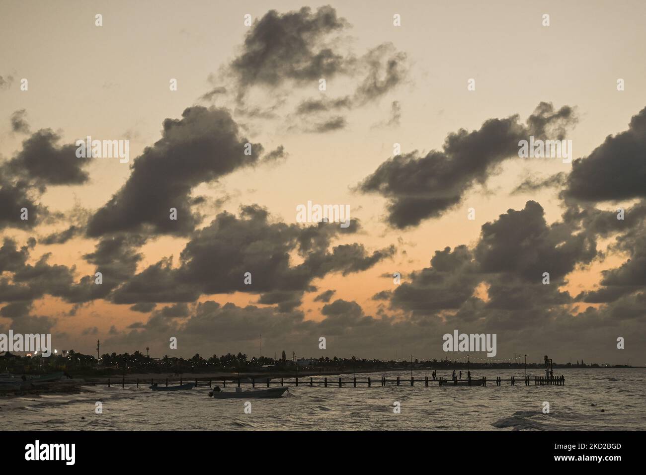 Wooden pier and fishing boats in Progreso. On Wednesday, February 09 ...