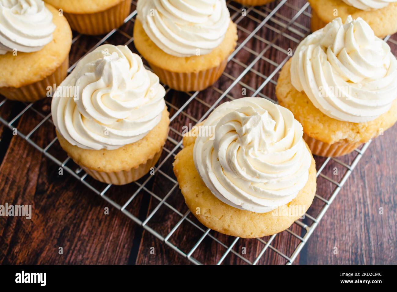 Homemade Vanilla Cupcakes on Wire Cooking Racks: Overhead view of ...