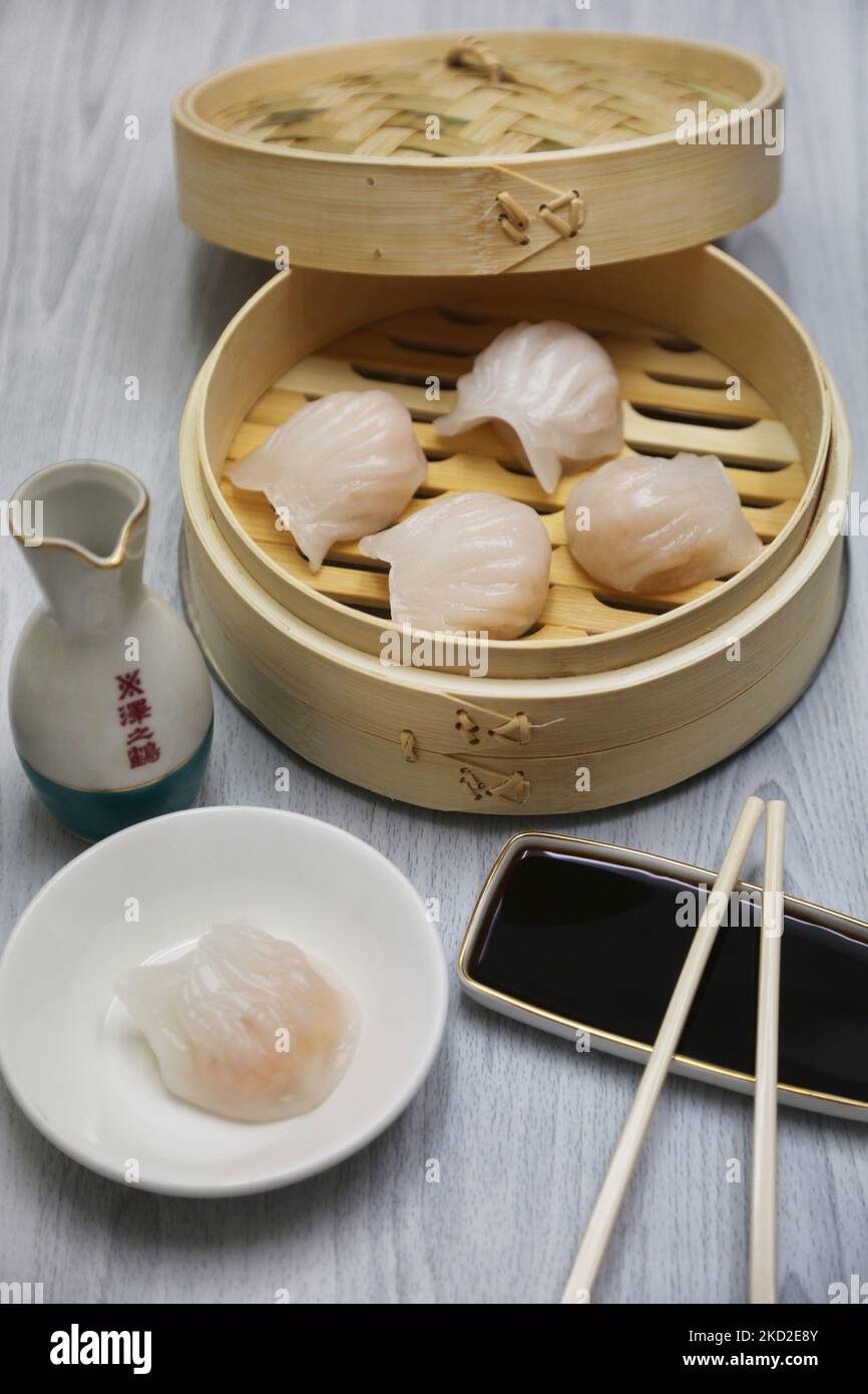 Har gow in a traditional bamboo steamer in Toronto, Ontario, Canada, on ...