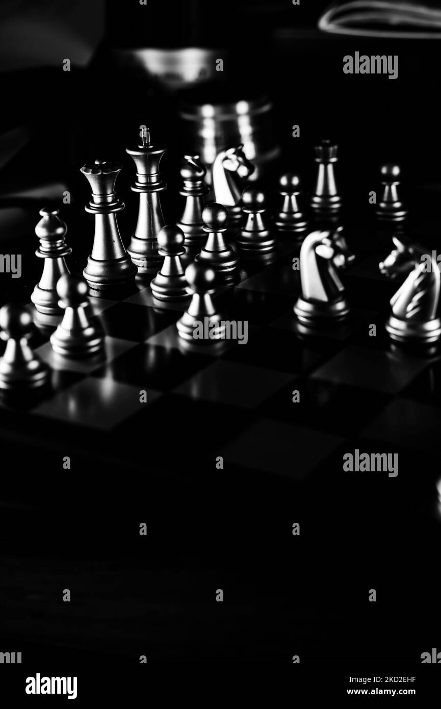 A vertical closeup of the chess pieces on the board Stock Photo - Alamy