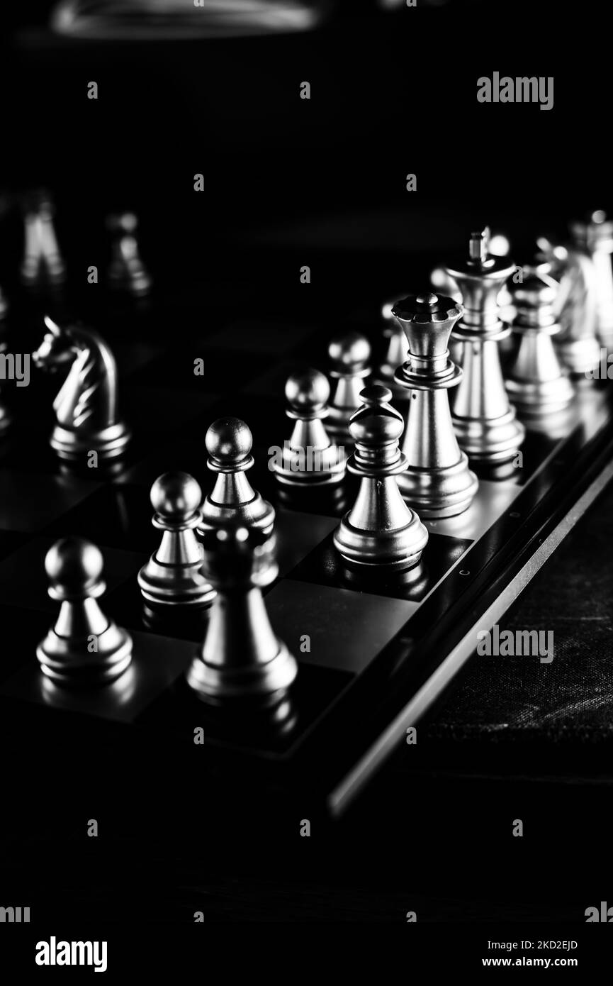 A vertical closeup of the chess pieces on the board Stock Photo - Alamy