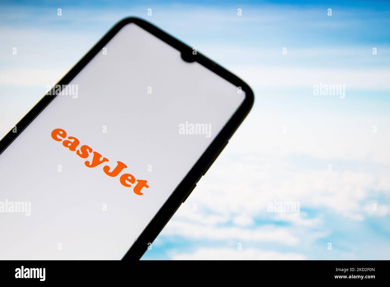 In this photo illustration an EasyJet airlines logo seen displayed on a ...