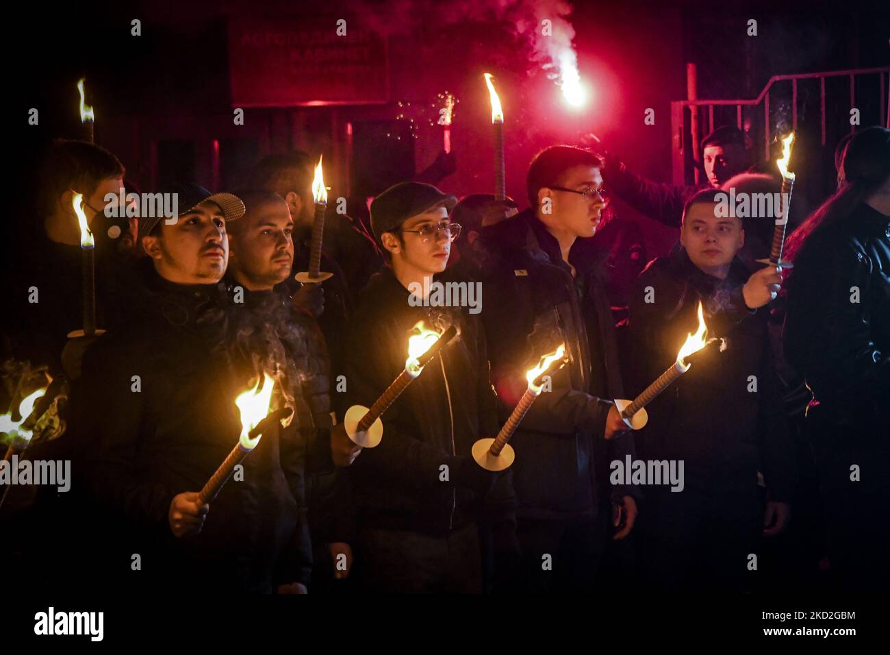 Far-right groups and nationalists carry torches and march to ...
