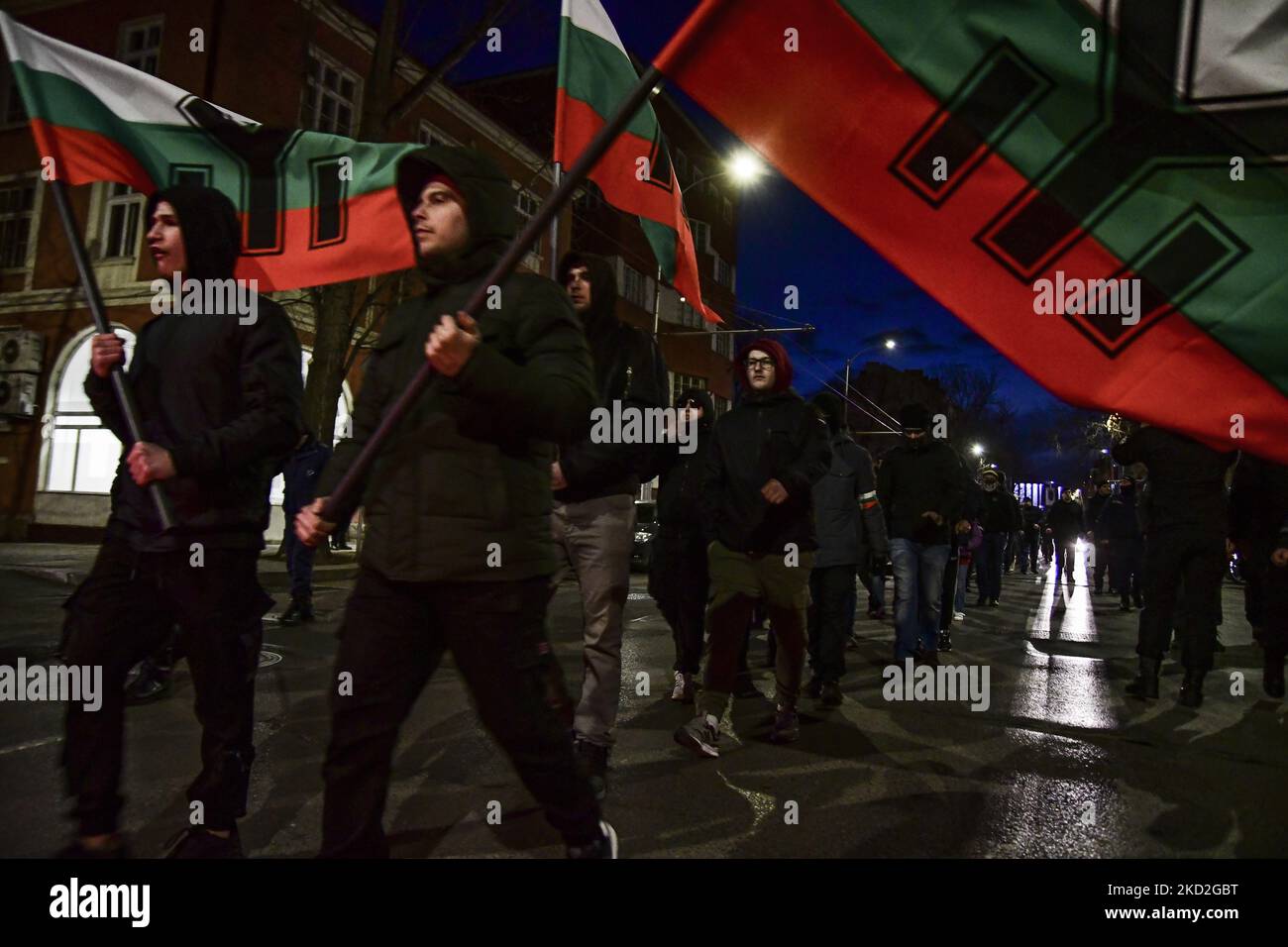 Far-right groups and nationalists carry torches and march to ...