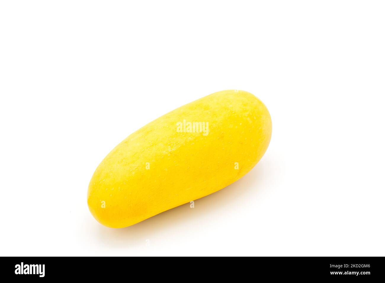 A yellow mango isolated on white background Stock Photo - Alamy