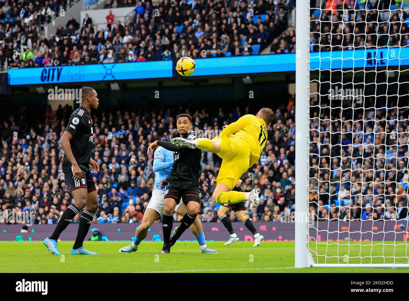 Bernd Leno #17 of Fulham makes an early save during the Premier League ...