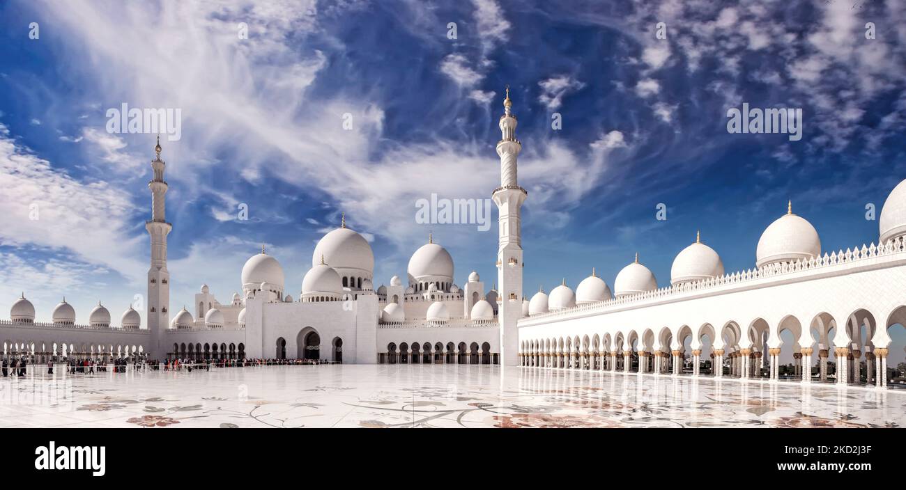 The landscape of the white Sheikh Zayed Grand Mosque on a sunny day ...