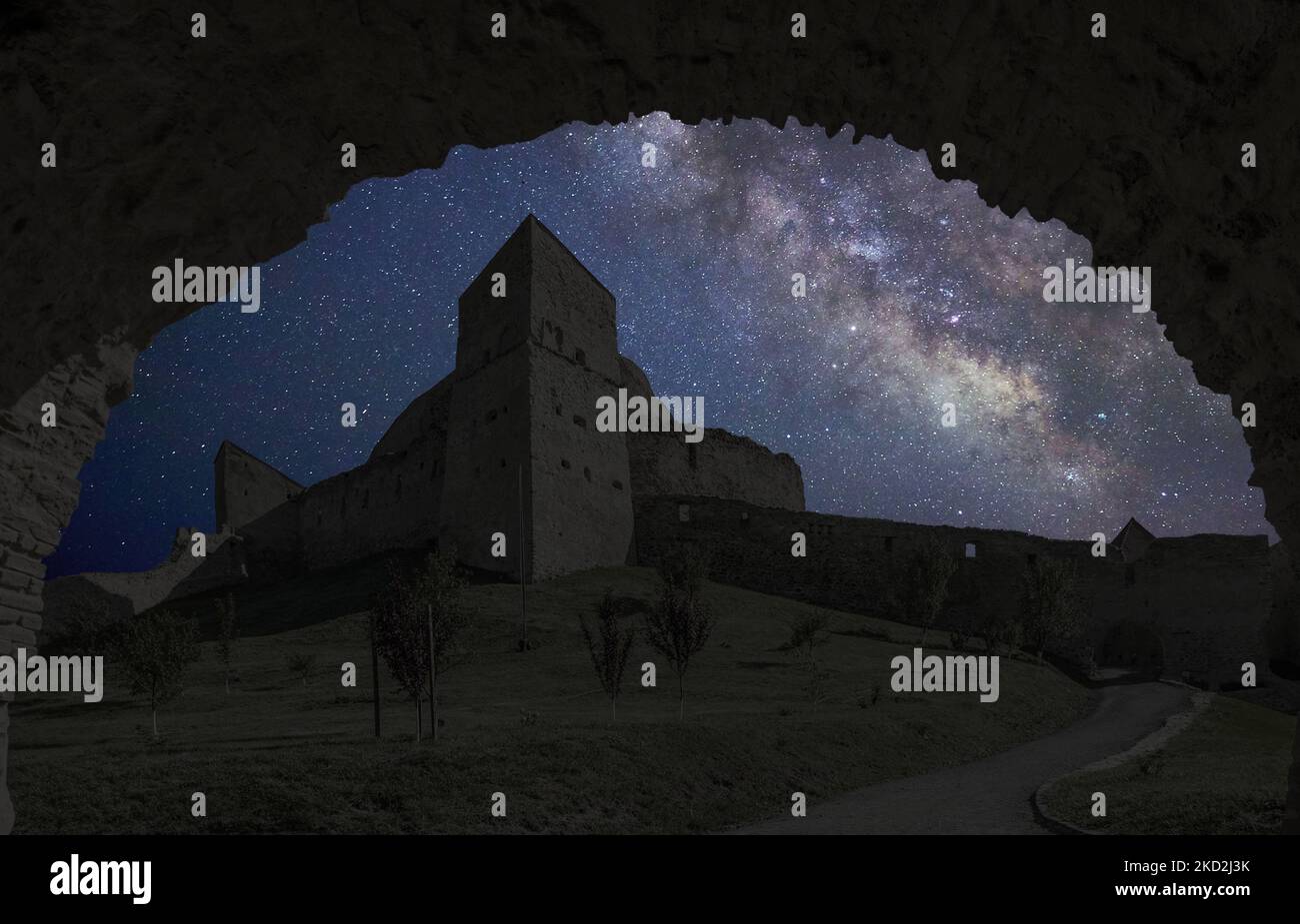 A mesmerizing starry night sky over the medieval building Stock Photo ...