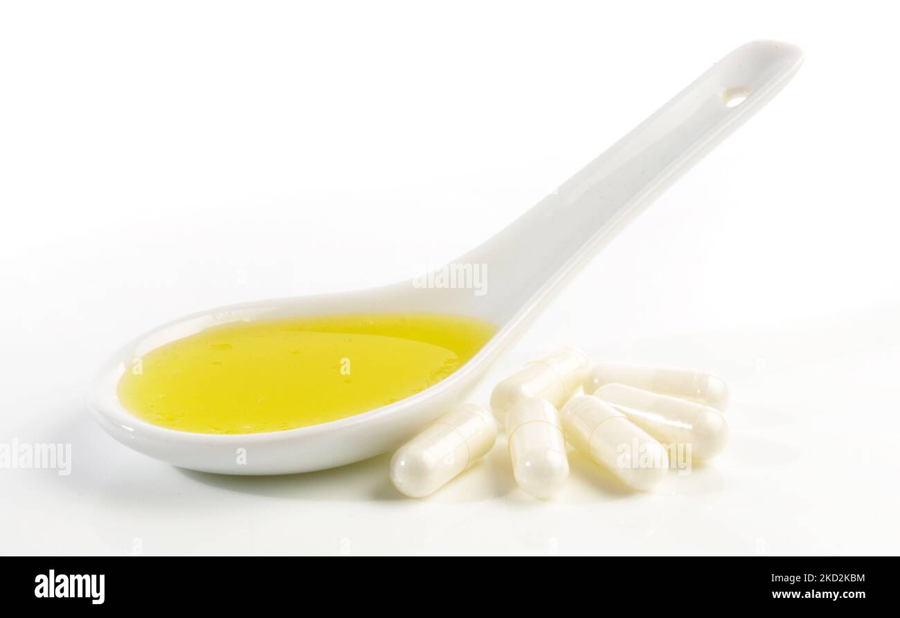 Butyrate Capsules with liquid Butter Stock Photo - Alamy