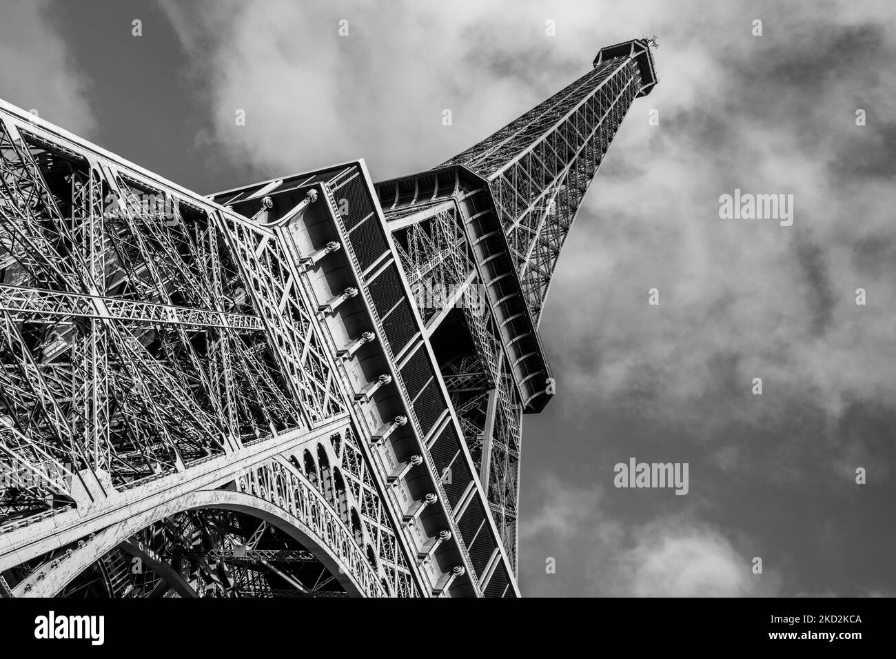 A low-angle greyscale shot of the Eiffel Tower in Paris, France Stock ...