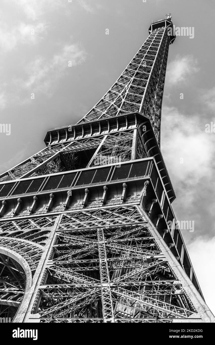 A low-angle greyscale shot of the Eiffel Tower in Paris, France Stock ...