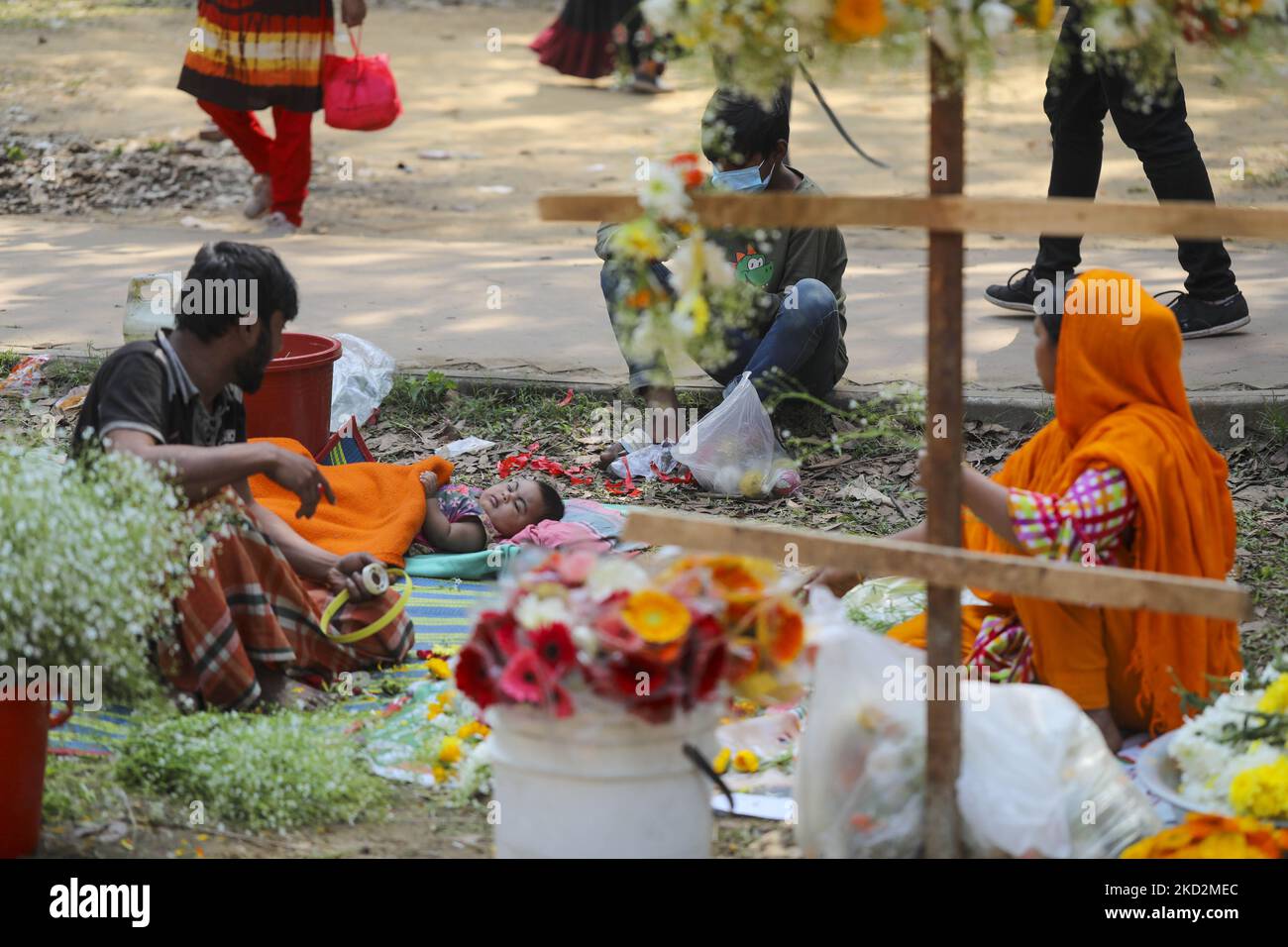 A infant seen while her parents mother is selling flower celebrate the ...