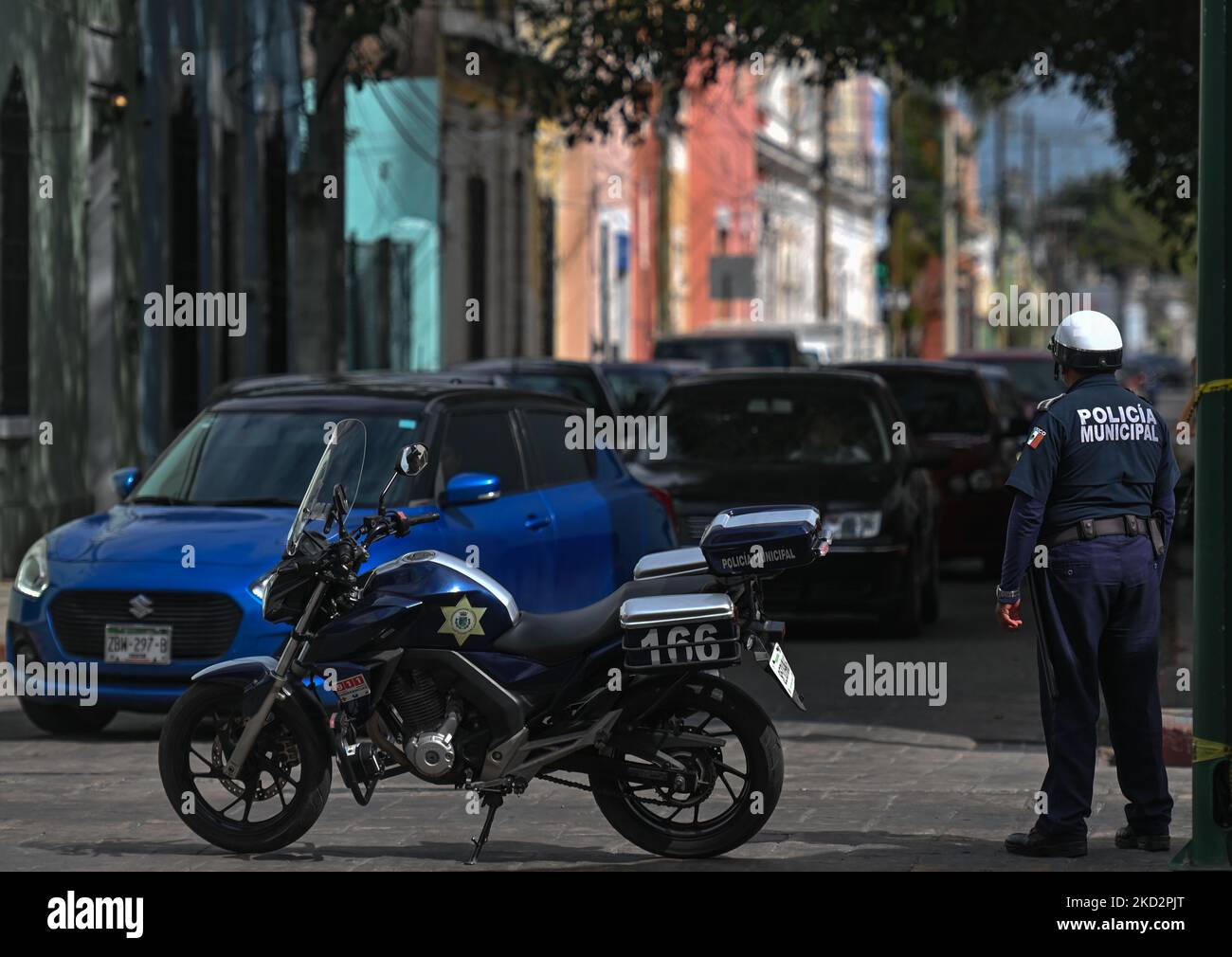 A member of the Municipal Police Department observing the traffic in ...