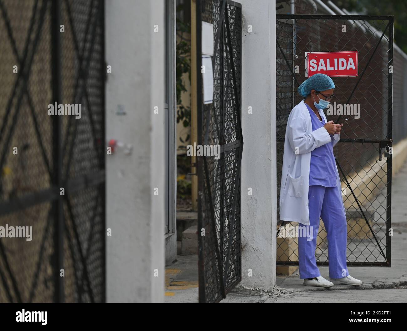Member of the medical staff seen at the exit of Merida Clinic. On ...