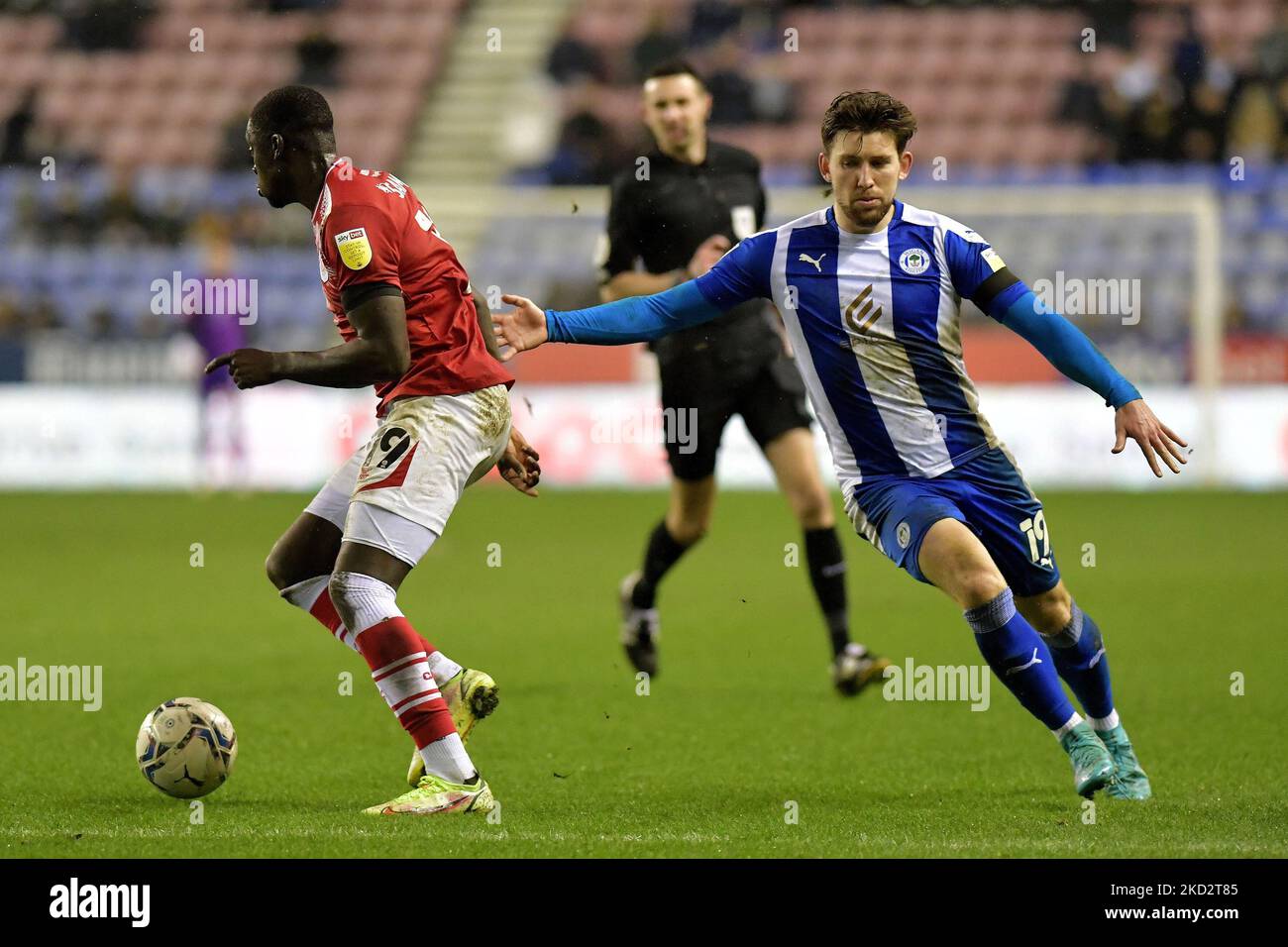 Bassala Sambou of Crewe Alexandra Football Club tussles with Callum ...