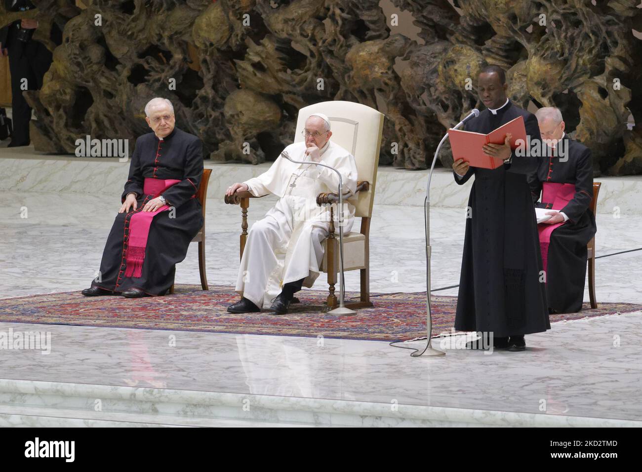 Pope Francis, center, flanked by Monsignor Leonardo Sapienza, left ...