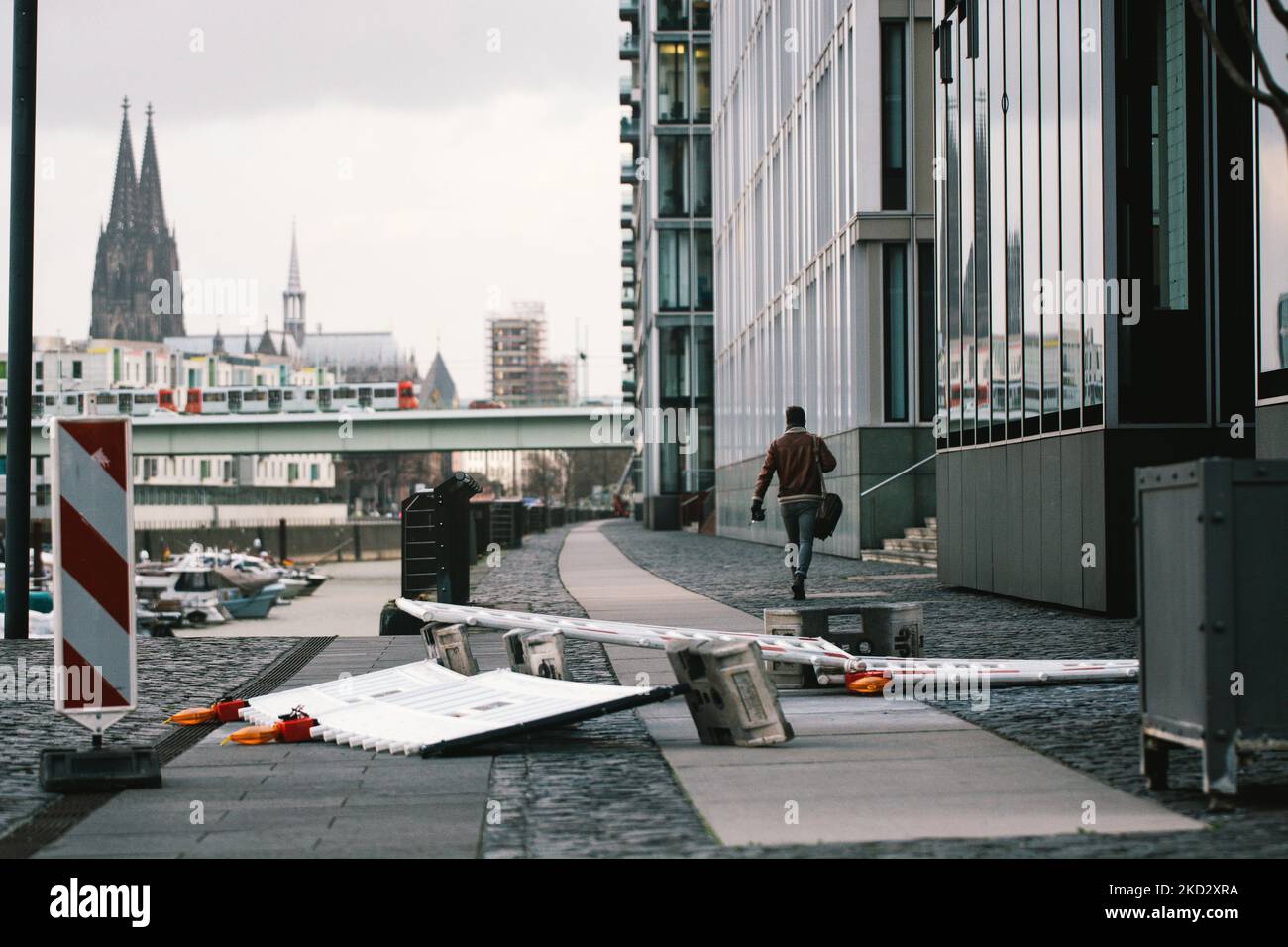 several road signs lie on the ground in Cologne as severe storm and ...