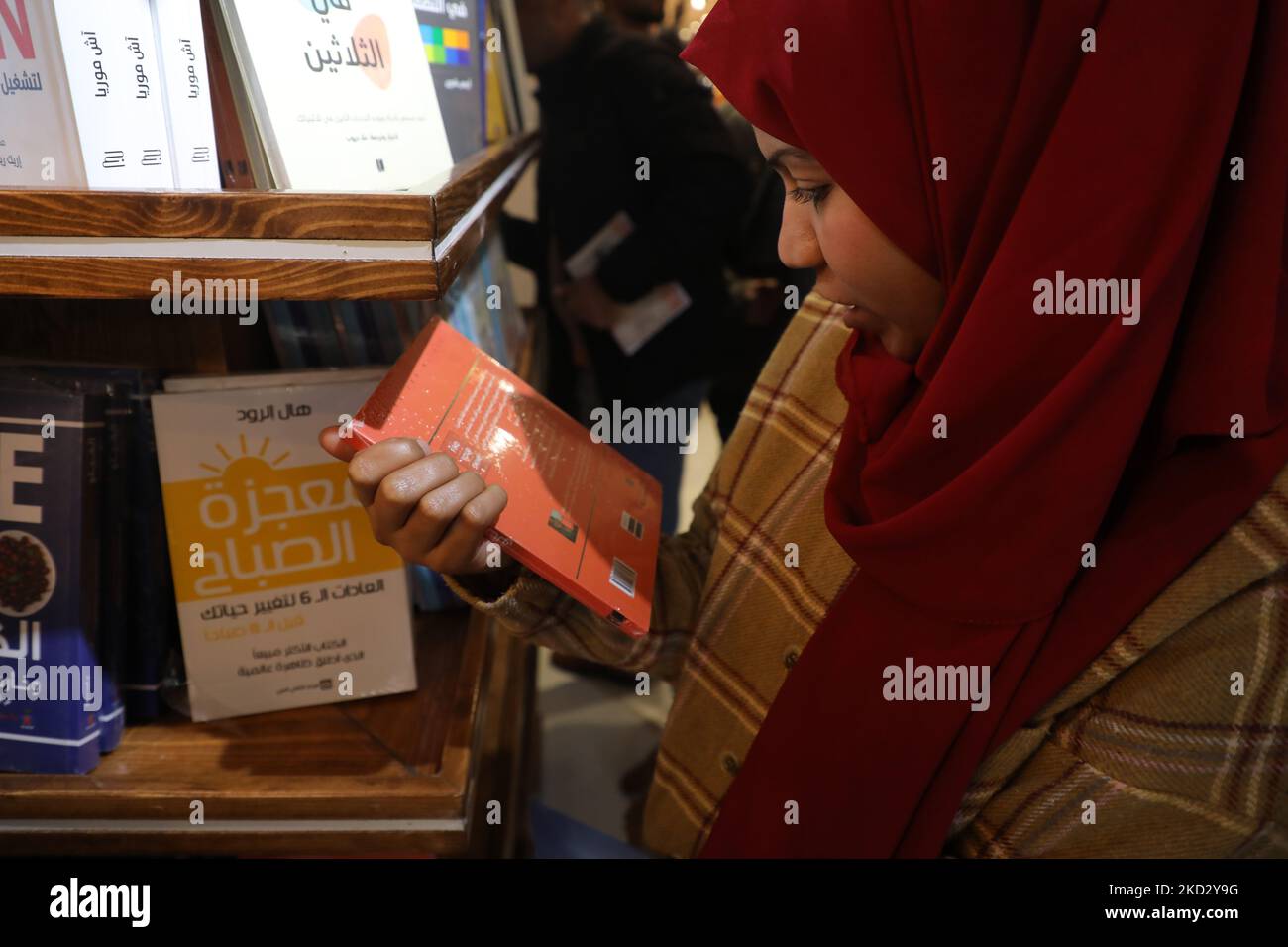 A Palestinian attends the reopening of the new Samir Mansour bookshop ...