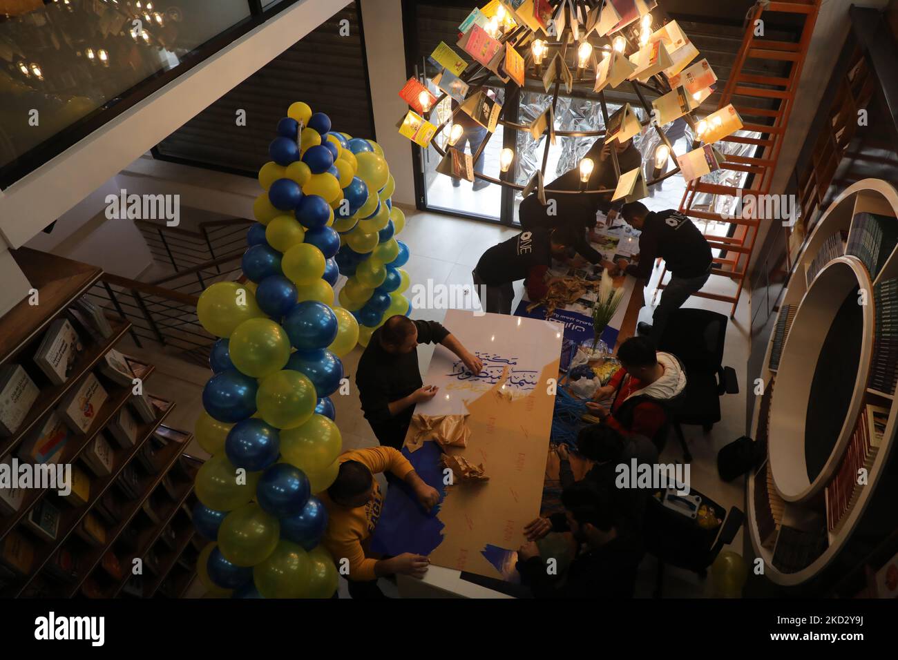 Workers prepare for the opening of the new Samir Mansour bookshop that ...