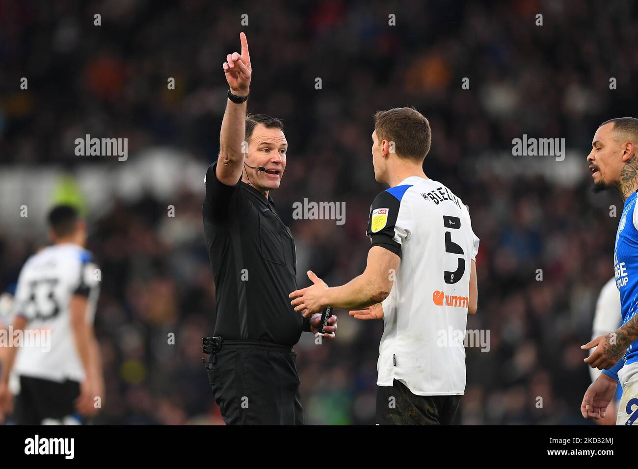 Referee, James Linington gestures to Krystian Bielik of Derby ...