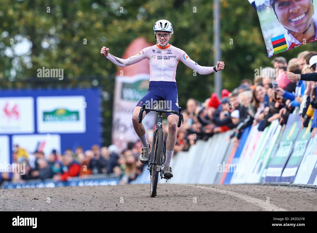 Dutch Fem Van Empel celebrates as she crosses the finish line to win ...