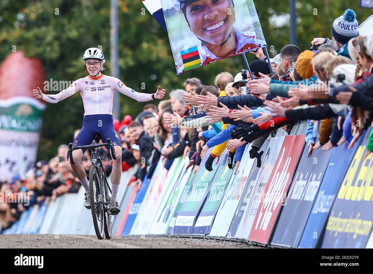 Dutch Fem Van Empel celebrates as she crosses the finish line to win ...