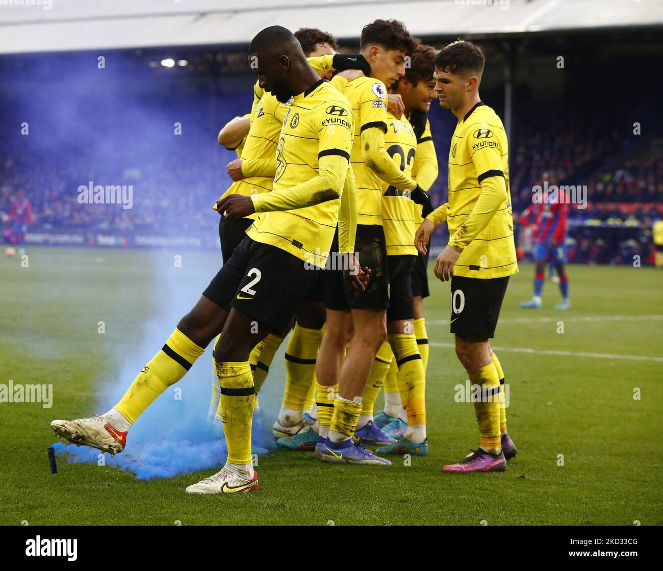 Chelsea's Antonio Rudiger kicks the flare awayduring Premier League ...