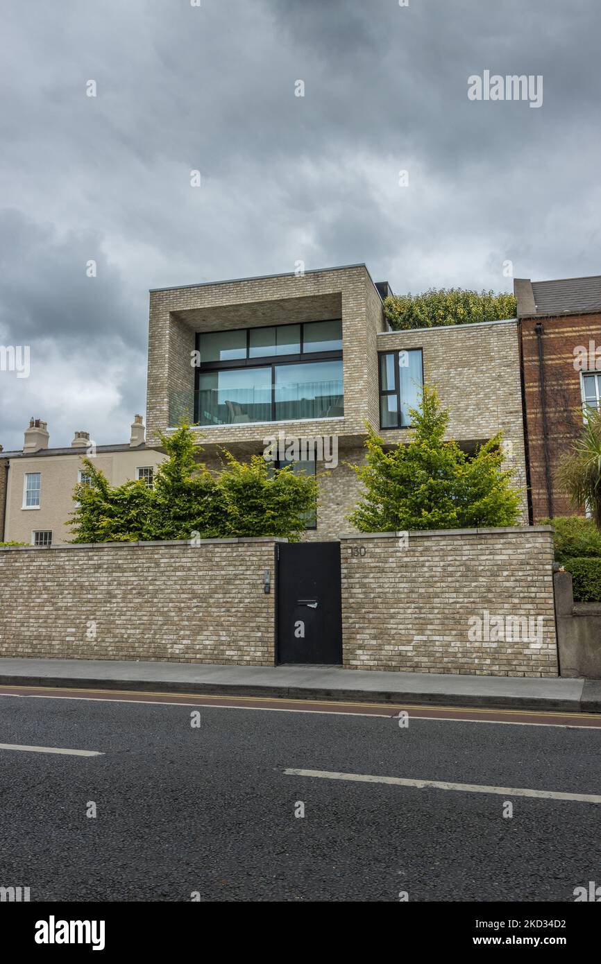The vertical view of Dublin city streetside residential building with ...