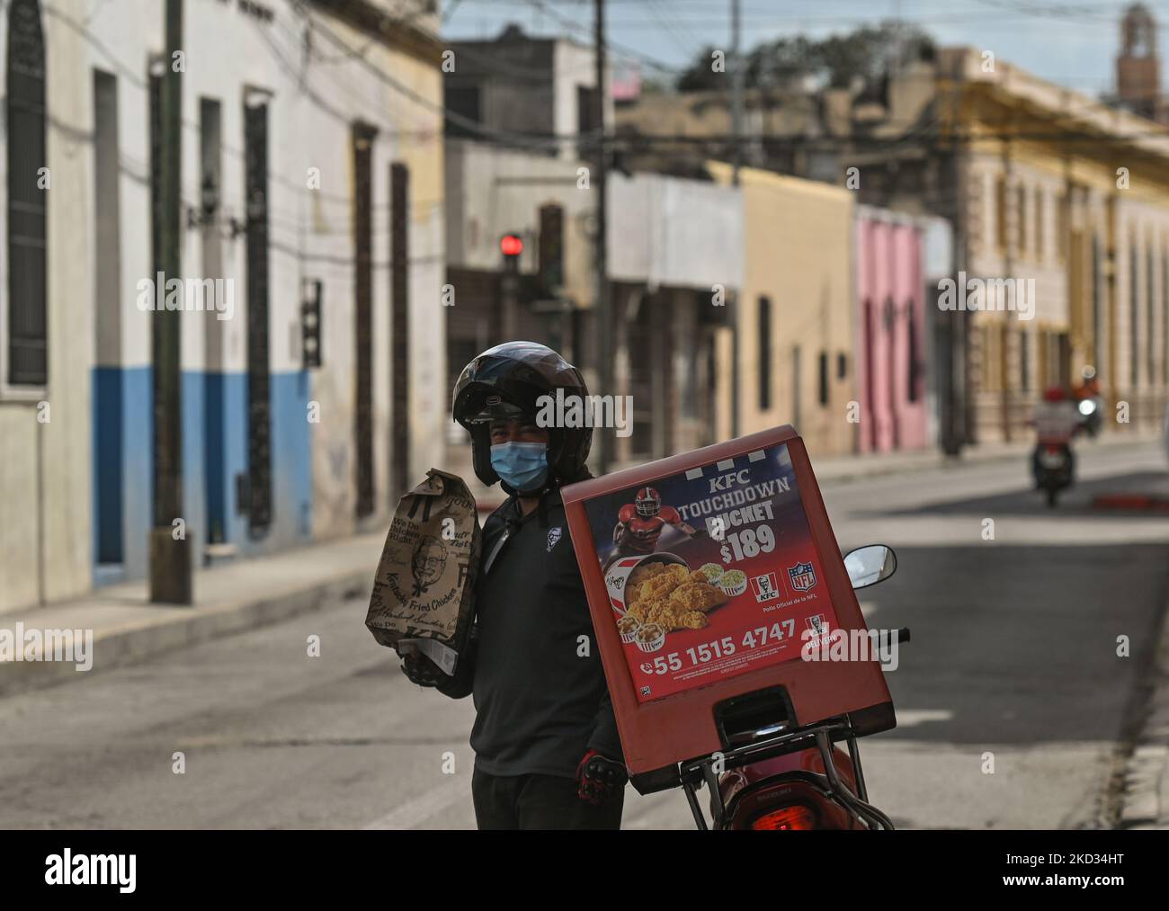Kfc food delivery courier hi-res stock photography and images - Alamy