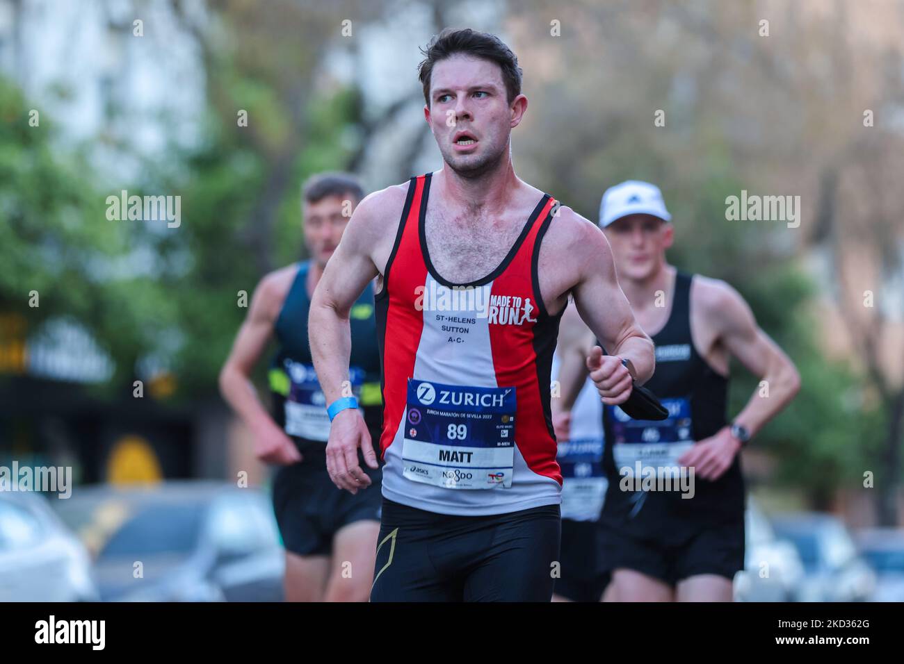 Participants run during the Zurich Seville Marathon in Seville, Spain ...