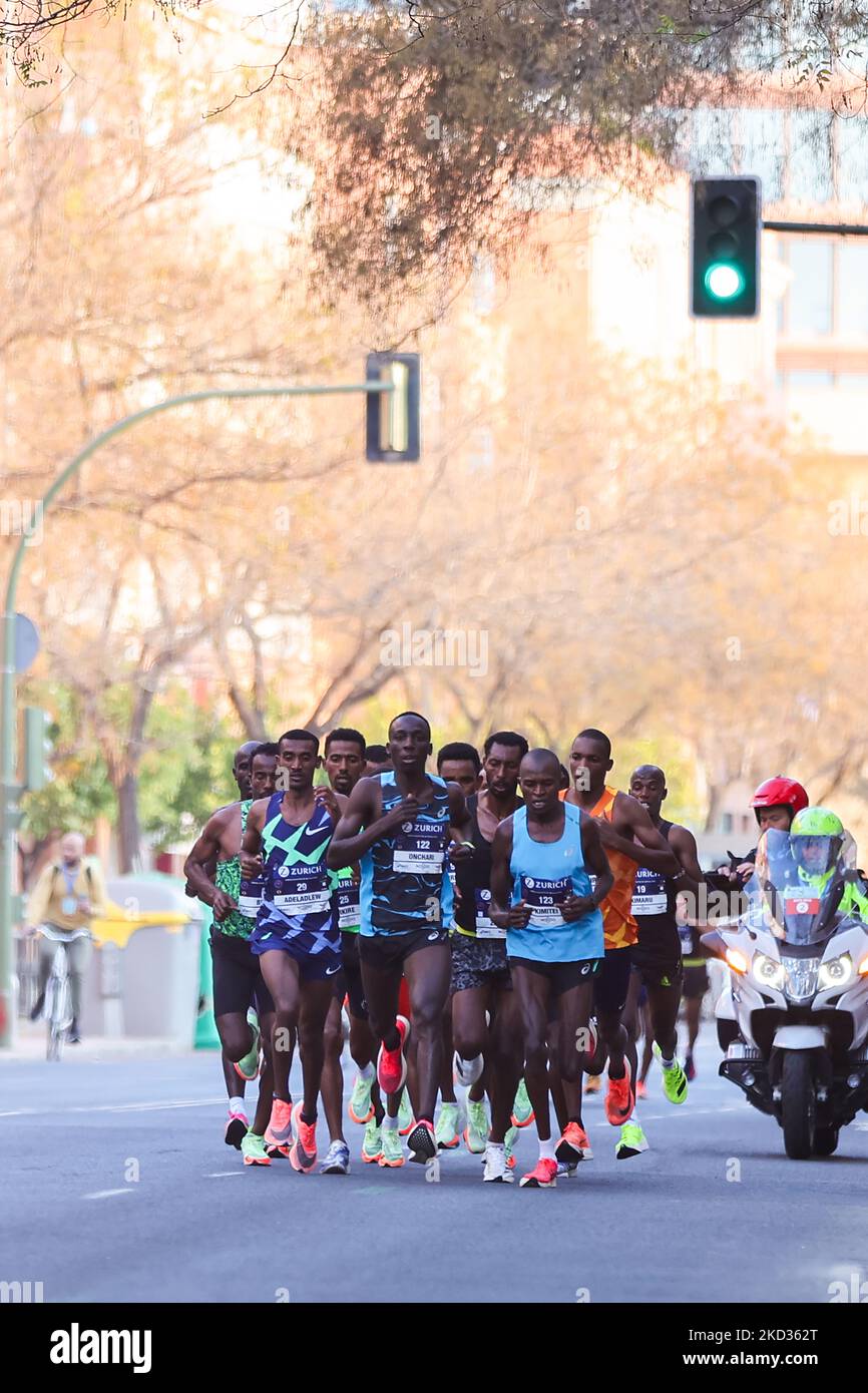 Participants run during the Zurich Seville Marathon in Seville, Spain ...
