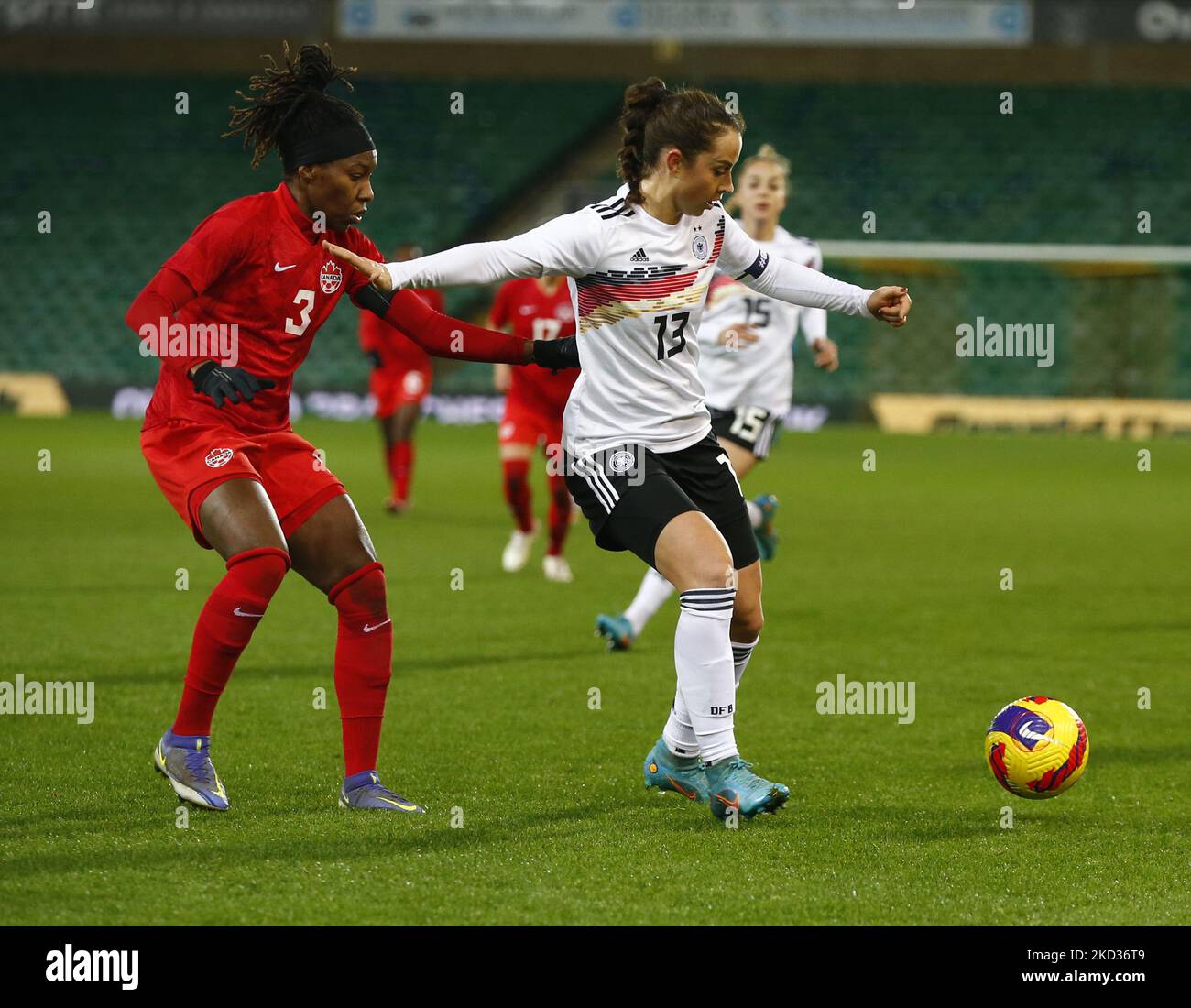 Sara Dabritz (Paris Saint-Germain) of Germany holds of Kadeisha ...