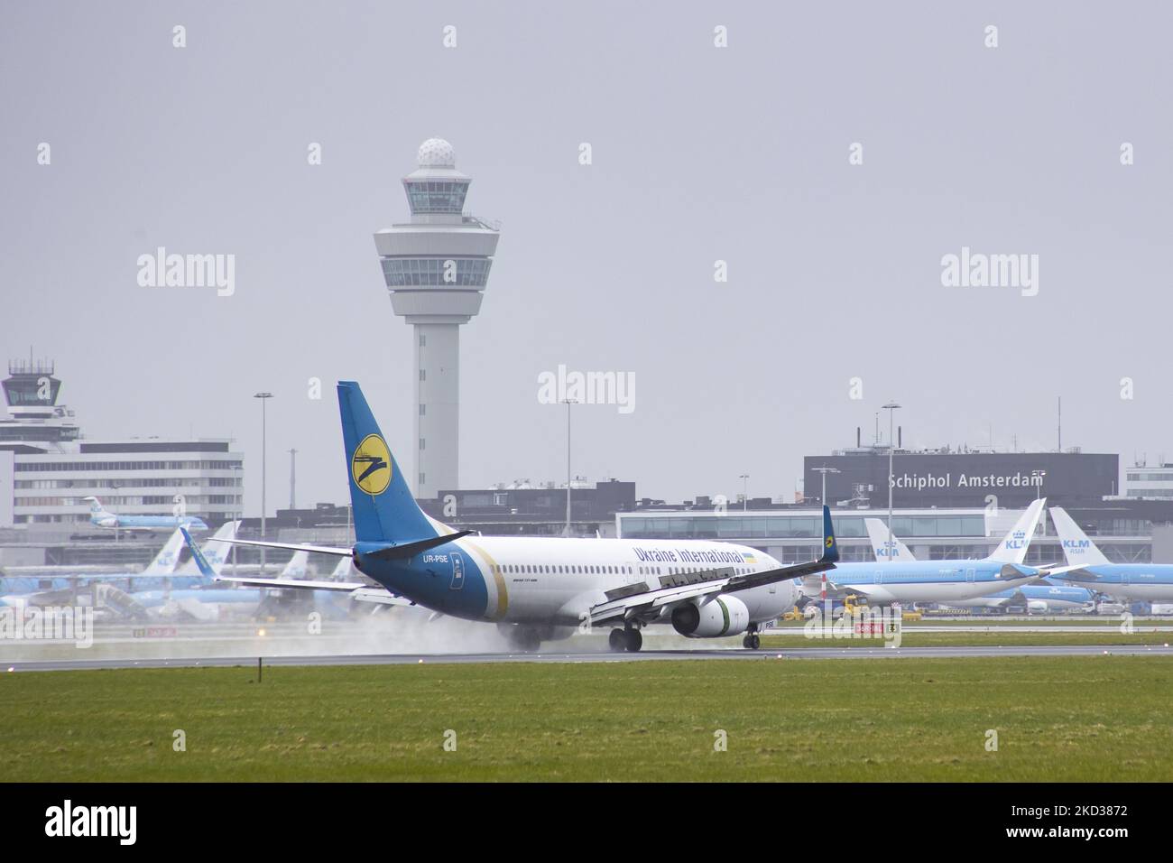 The Boeing 737NG of UIA passing the control tower and terminal of ...