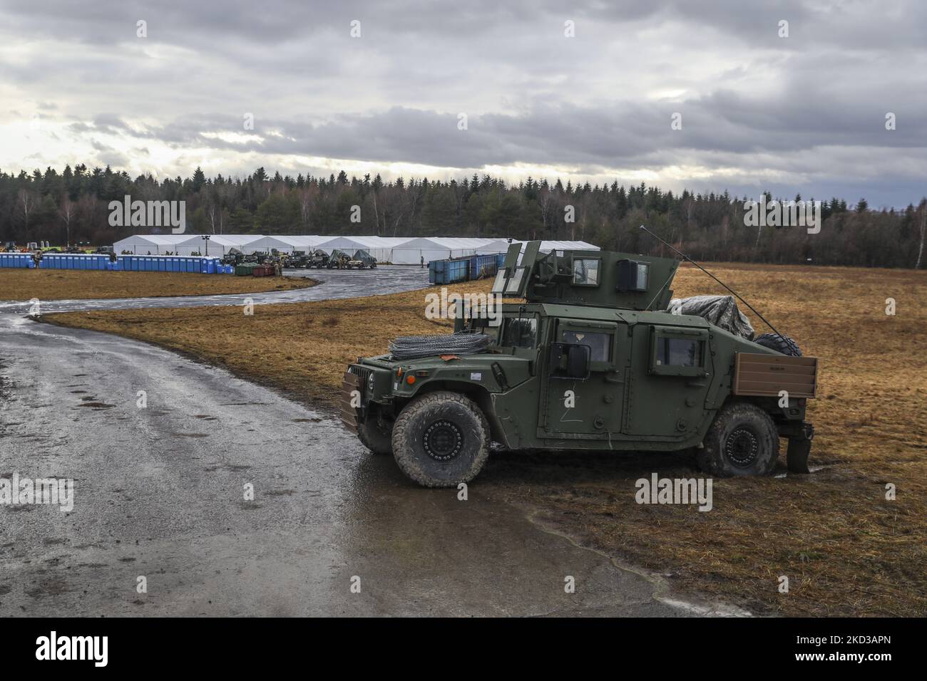 U.S. military vehicles are seen at the temporary military base for U.S ...