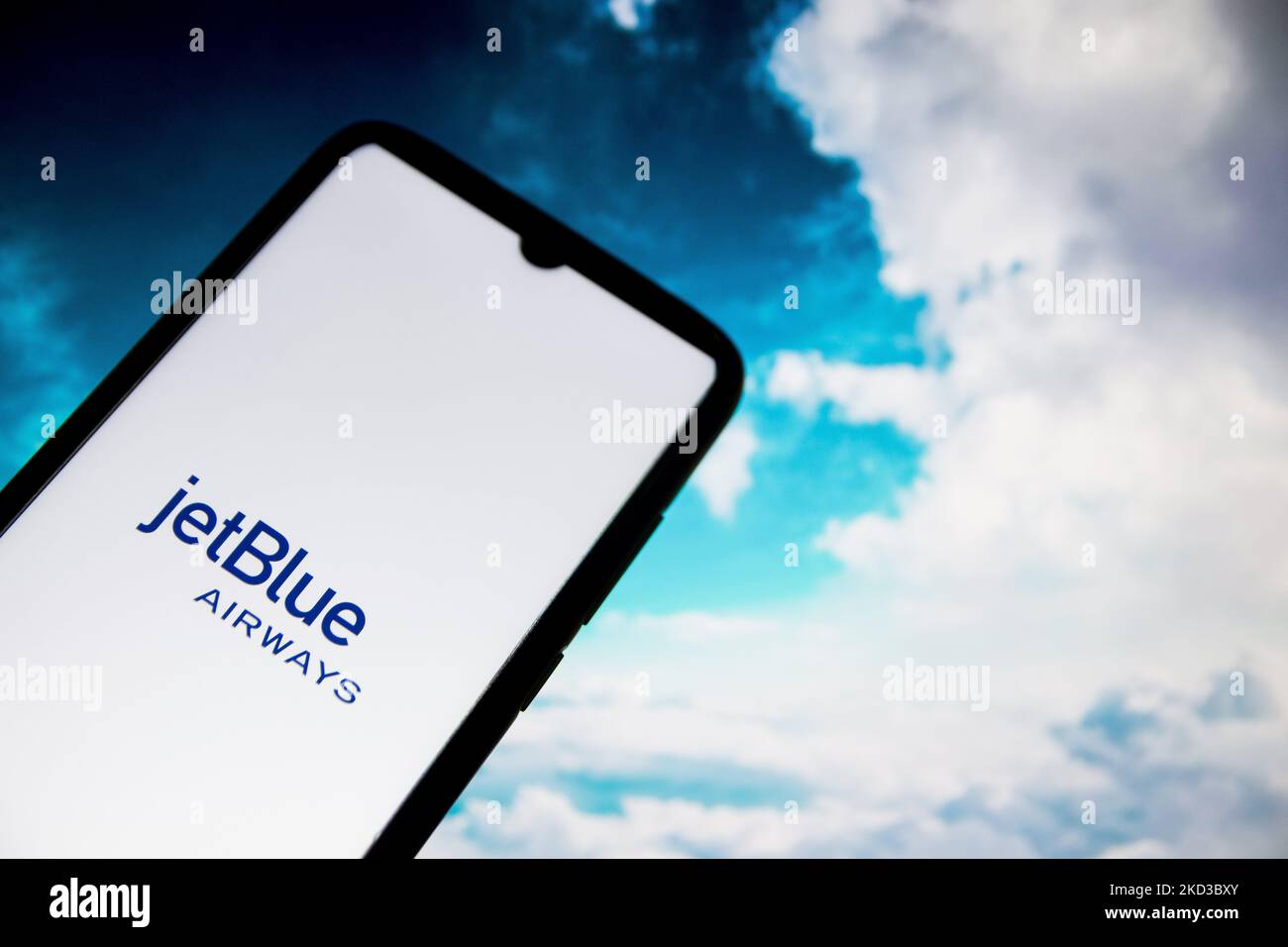 In this photo illustration a JetBlue Airways airlines logo seen ...