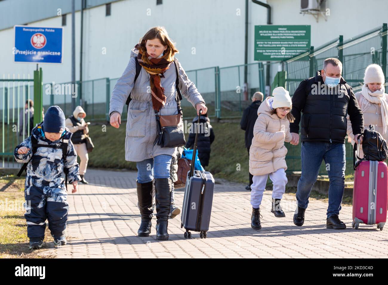 First migrants from Ukraine enter Poland after Russia bombarded ...