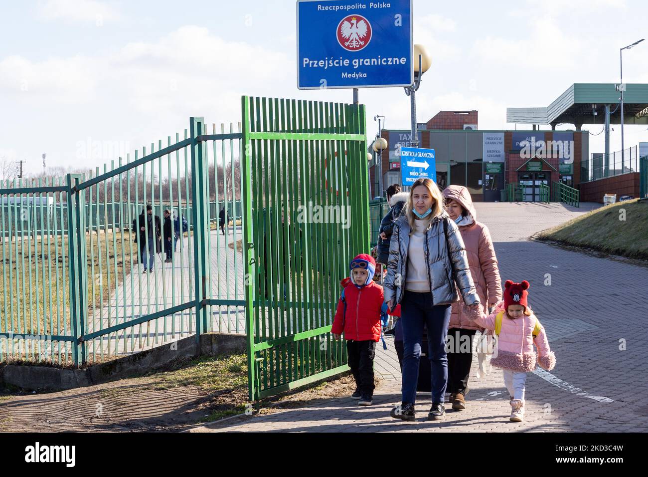 First migrants from Ukraine enter Poland after Russia bombarded ...