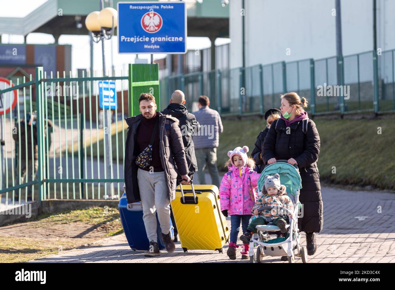 First migrants from Ukraine enter Poland after Russia bombarded ...