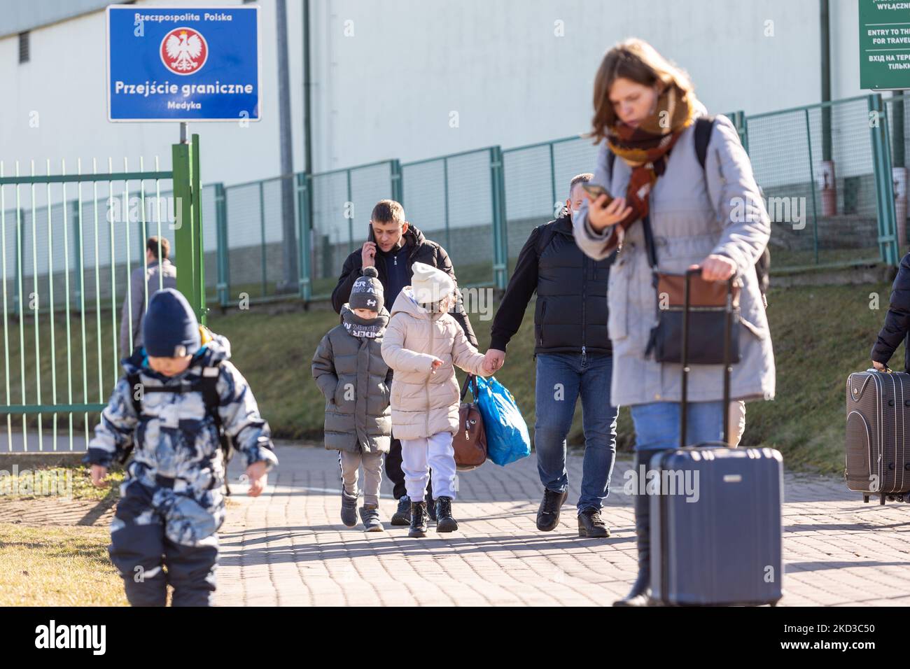 First migrants from Ukraine enter Poland after Russia bombarded ...